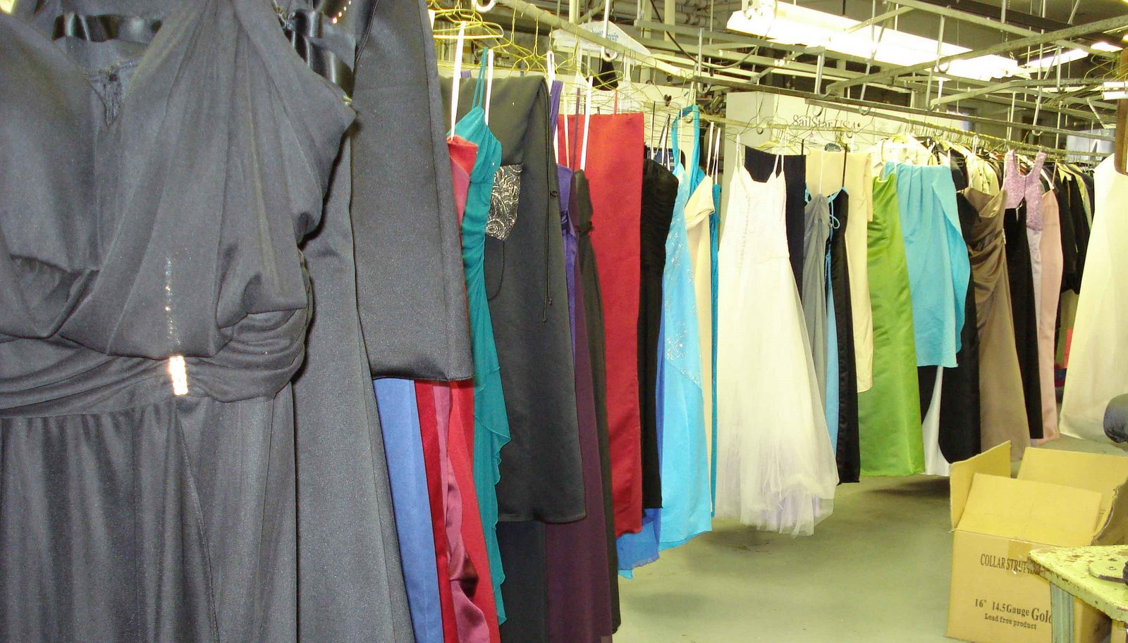 1,300 New & Used Dress Donated by Janet Davis Dry Cleaners