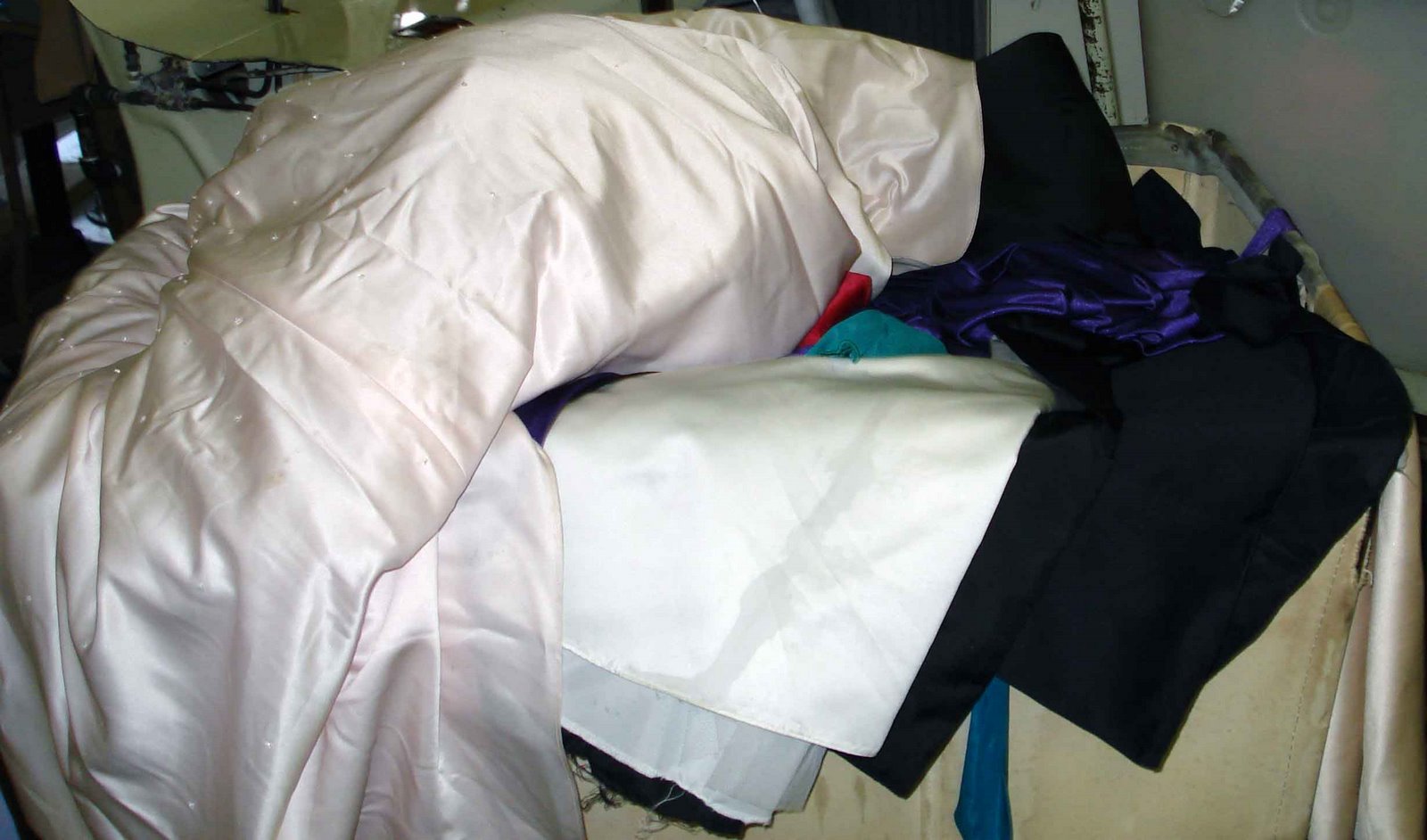 1,300 New & Used Dress Donated by Janet Davis Dry Cleaners